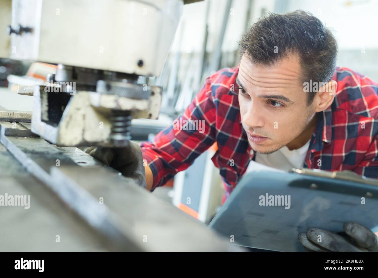 Mechanical engineer checking machine hi-res stock photography and ...
