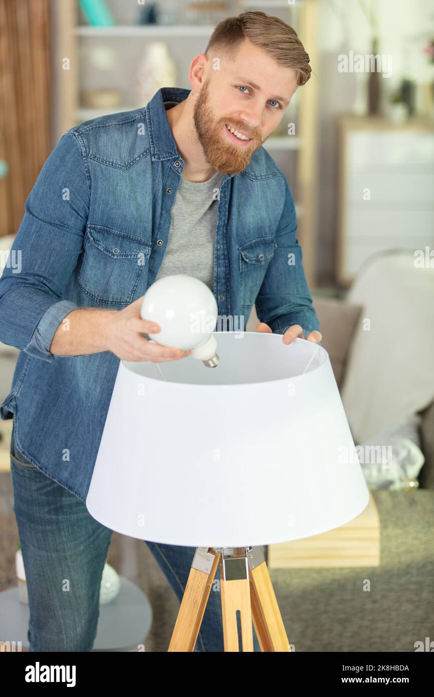 Changing lightbulb ladder hi-res stock photography and images - Alamy