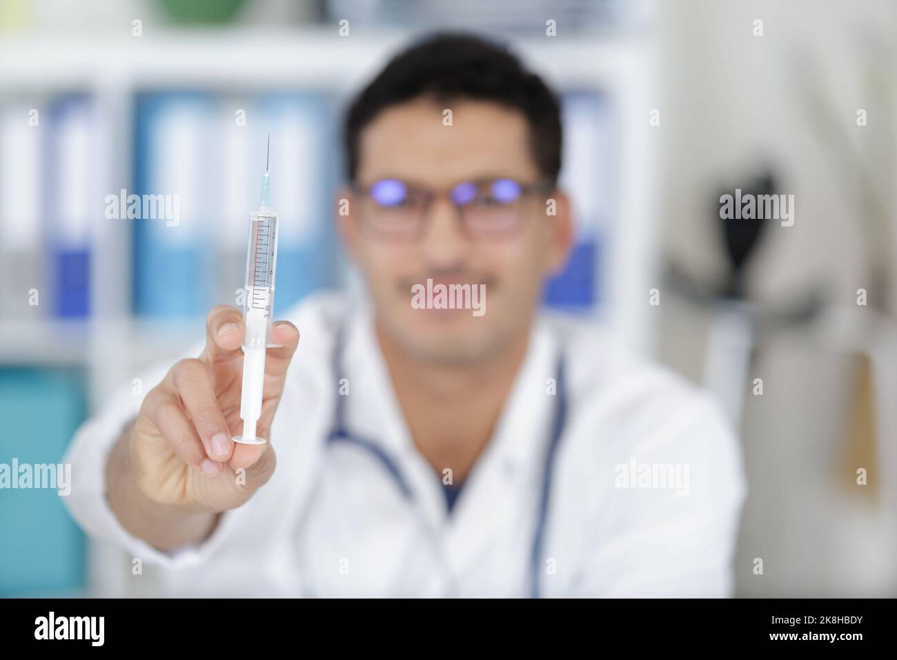 close up of doctor holding syringe with injection Stock Photo - Alamy