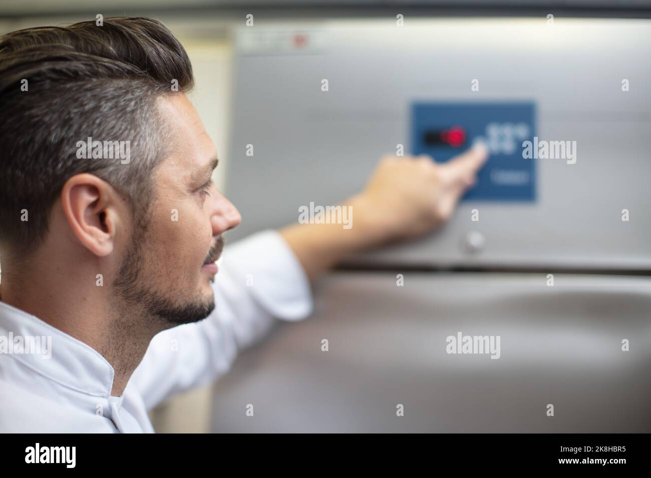 portrait of chef cook in uniform standing with ice cream Stock Photo ...