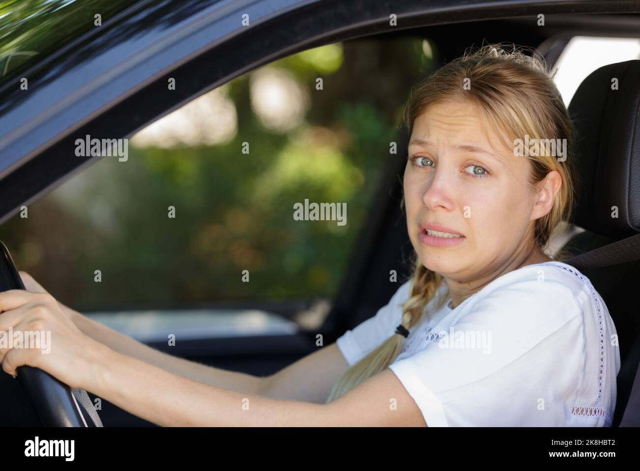 picture of scared female driver Stock Photo - Alamy