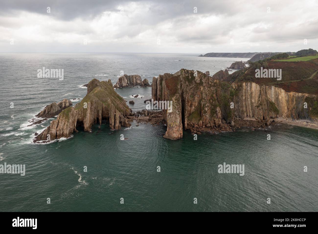 Silence beach, silver-sandy cove backed by a natural rock amphitheatre ...