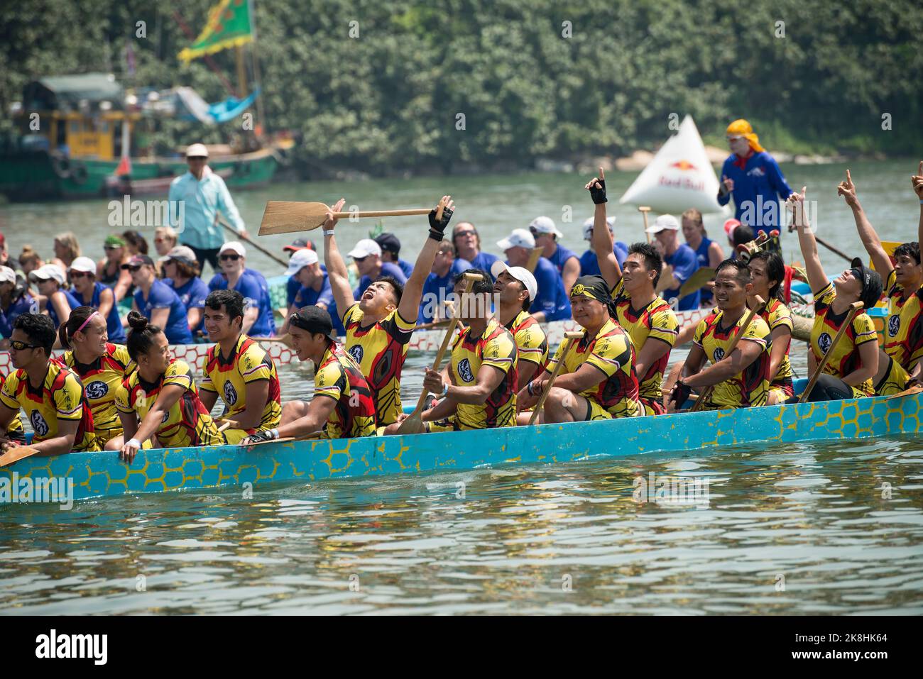A winning team celebrates aafter a race at the Dragon Boat Festival on ...