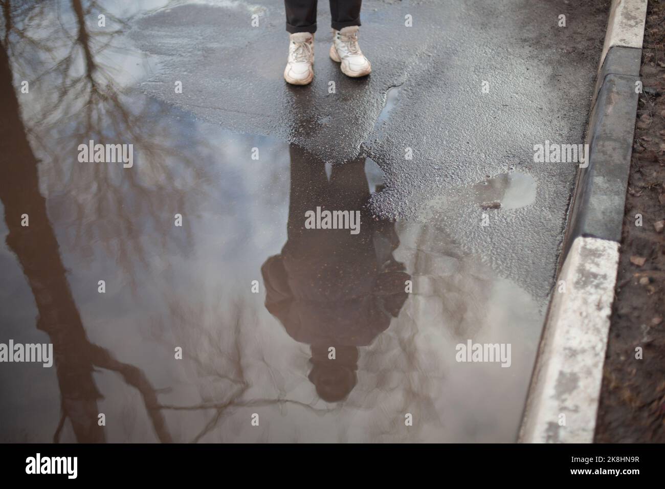 Shoe foot puddle hi-res stock photography and images - Alamy