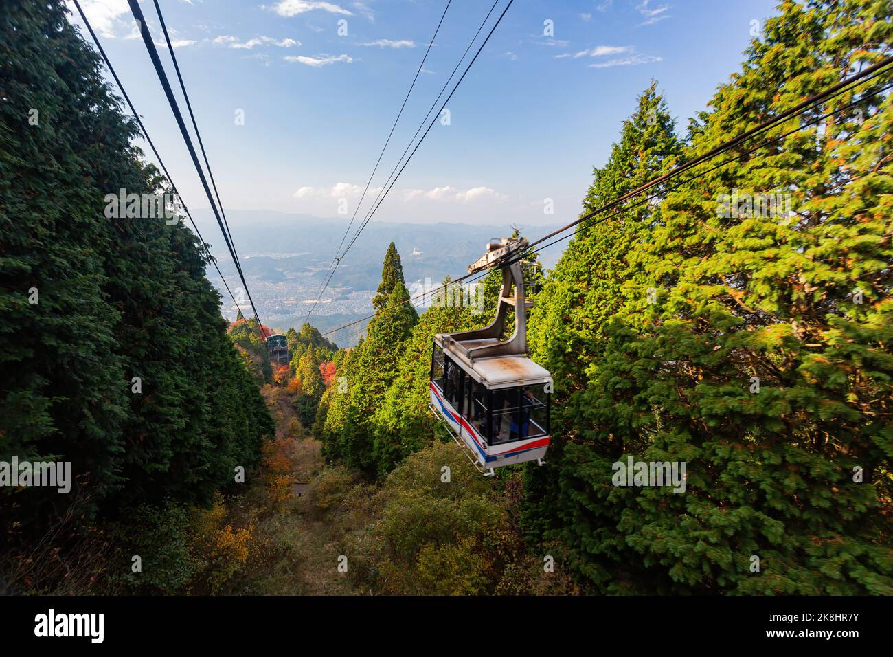 Daytime view of the beautiful fall color along the Eizan Cable Car ...