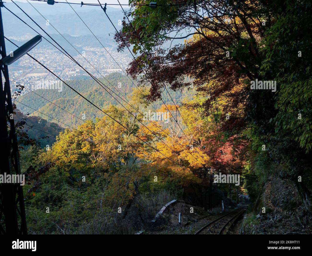 Daytime view of the beautiful fall color along the Eizan Cable Car ...
