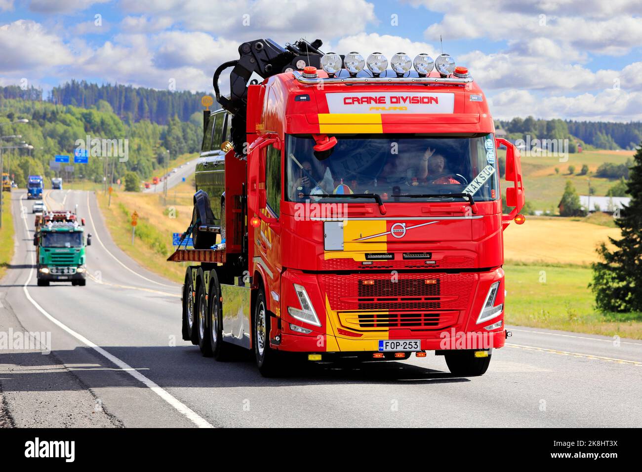 New Volvo flatbed recovery truck with mounted crane in convoy to Power ...