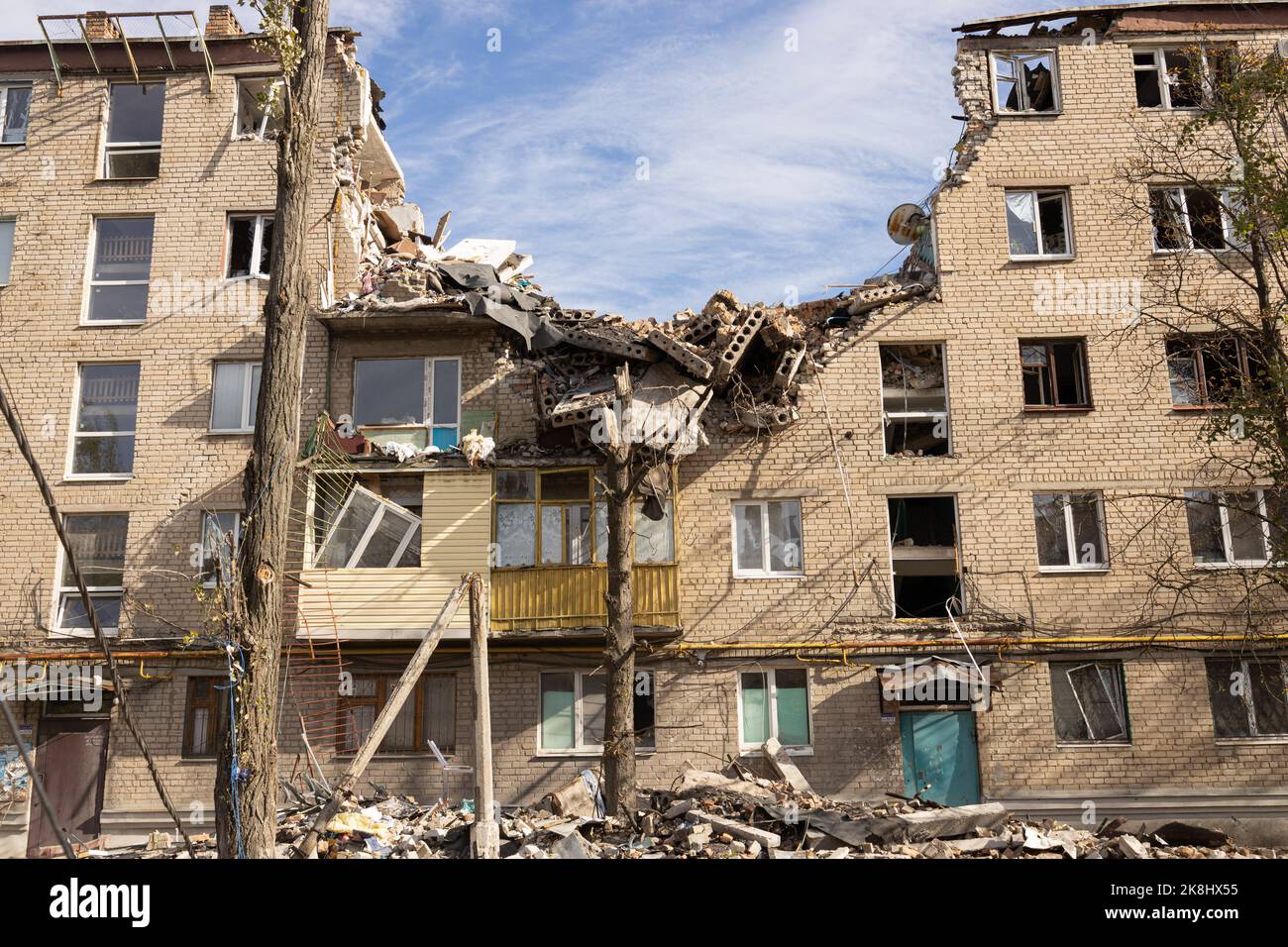 A destroyed residential building after a Russian shelling in the city ...