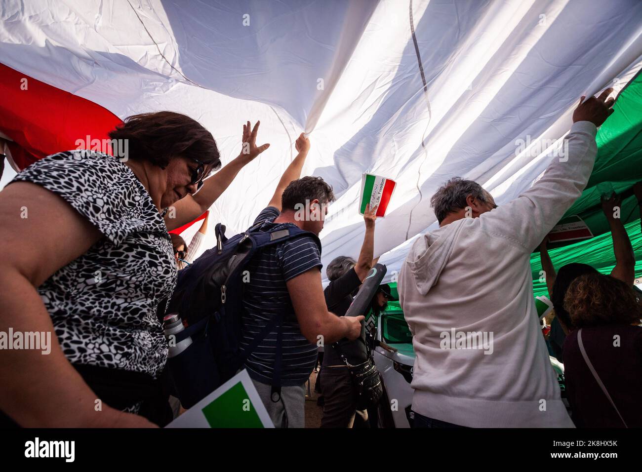 Washington, United States. 22nd Oct, 2022. Demonstrators carry an ...
