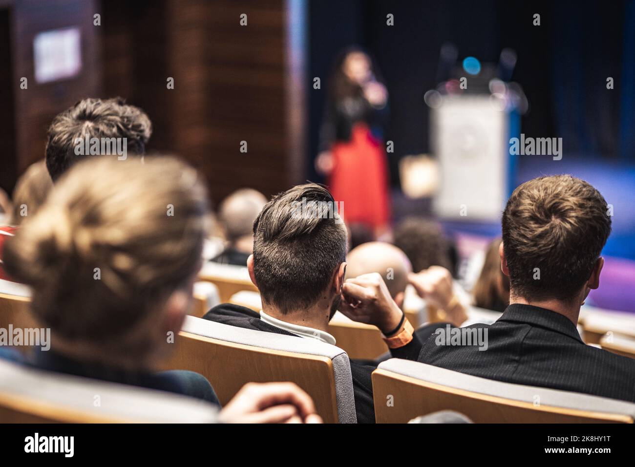 Woman giving presentation on business conference event Stock Photo - Alamy
