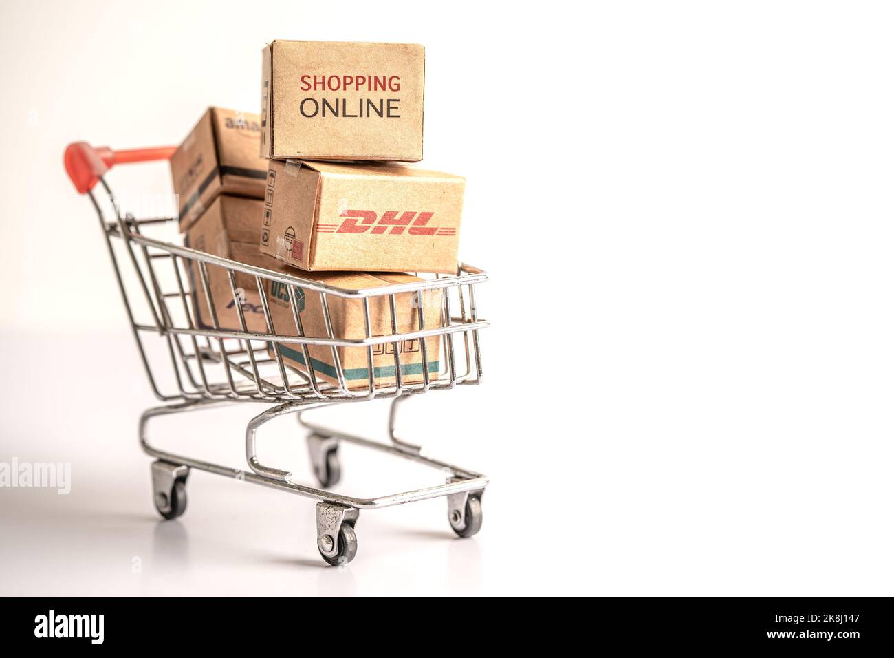Bangkok, Thailand - September 26, 2022 Shopping cart with DHL Amazon ...
