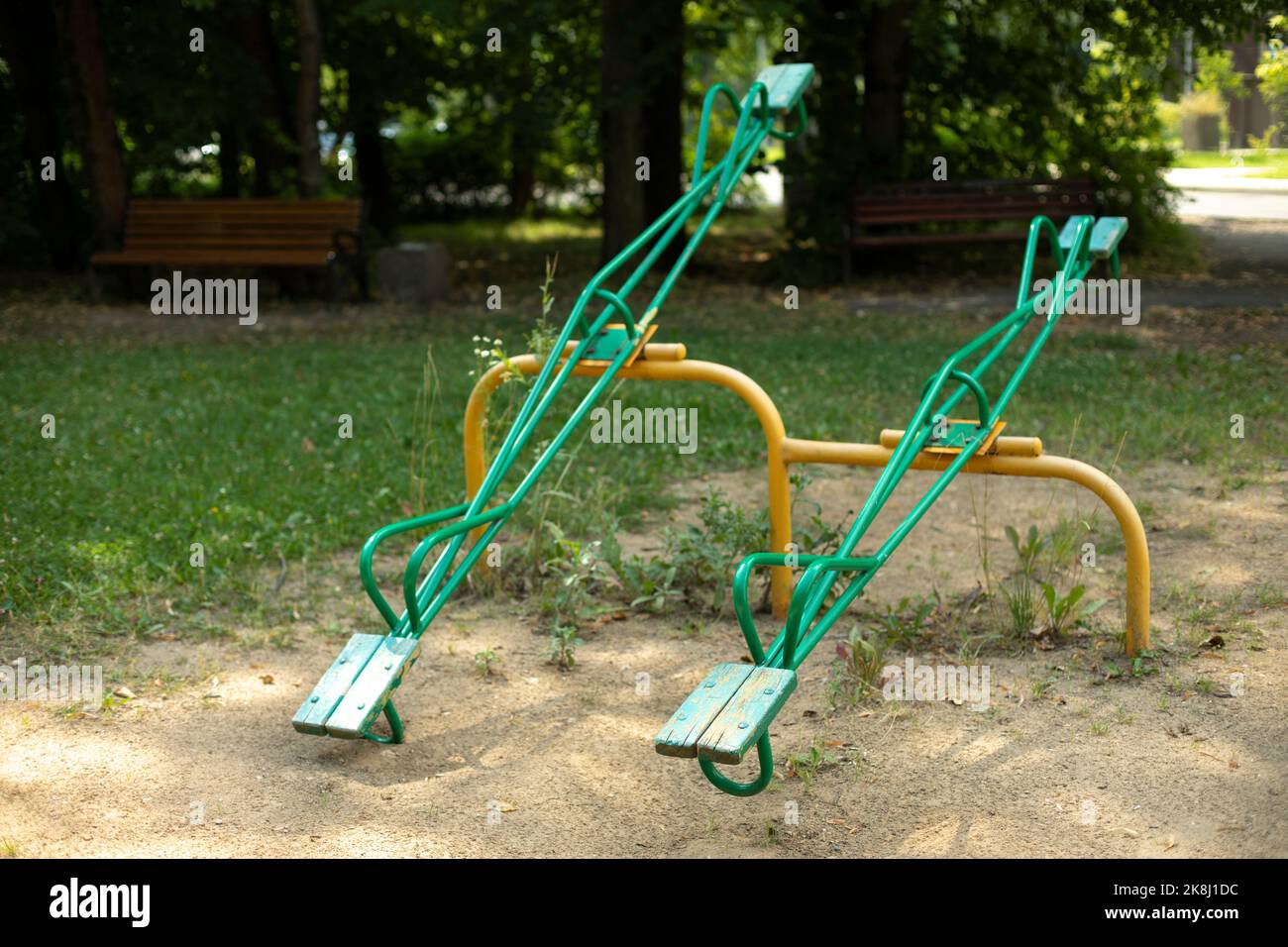 Children's playground in yard. Place for children to play. Carousels ...