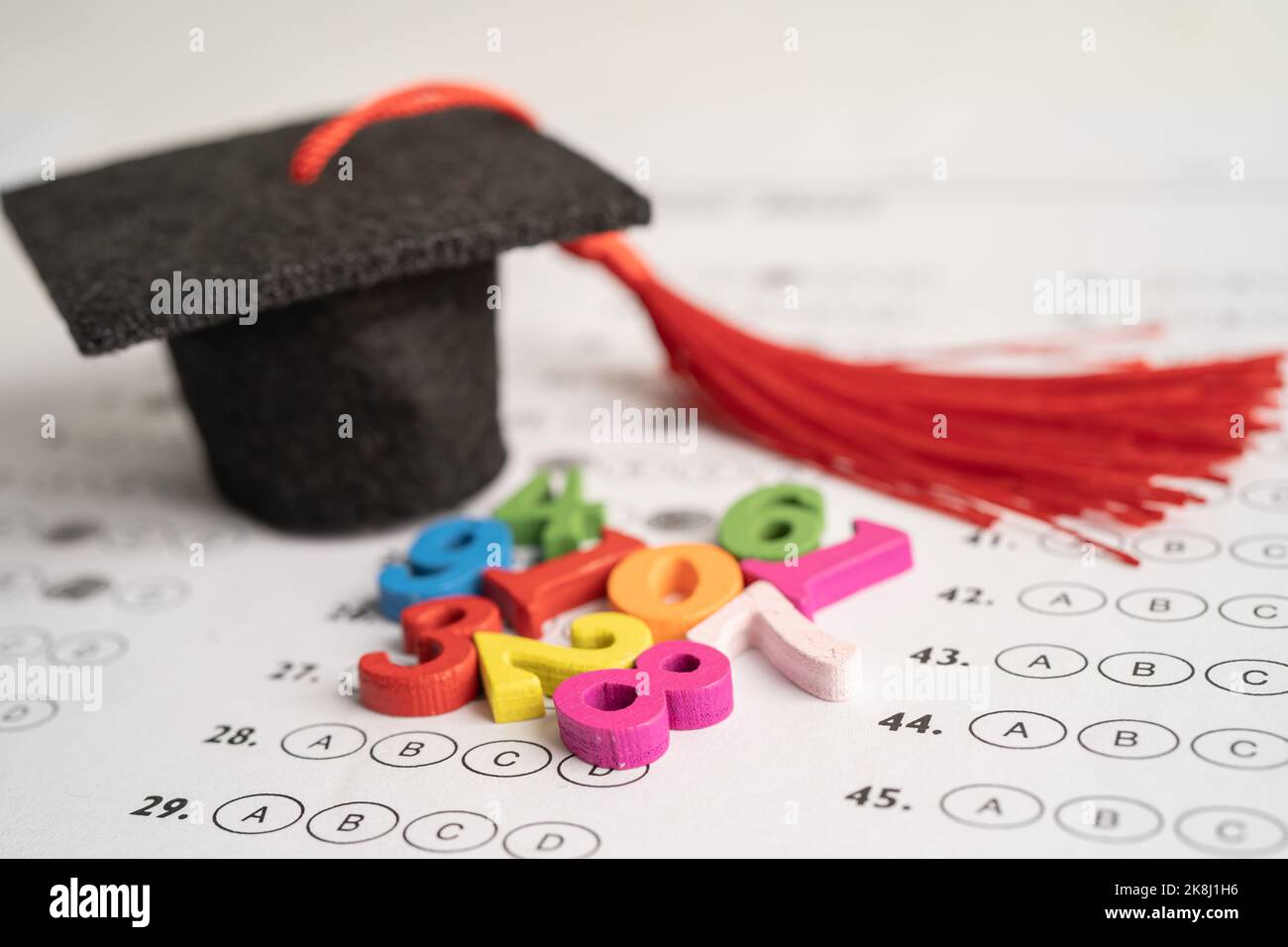 Math Number colorful with graduation hat and pencil on Answer sheet ...