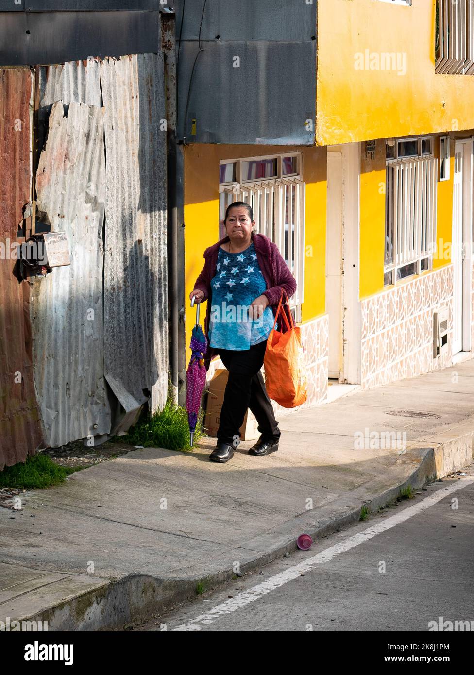Filandia, Quindio, Colombia - June 5 2022: Old Colombian Woman Carrying ...