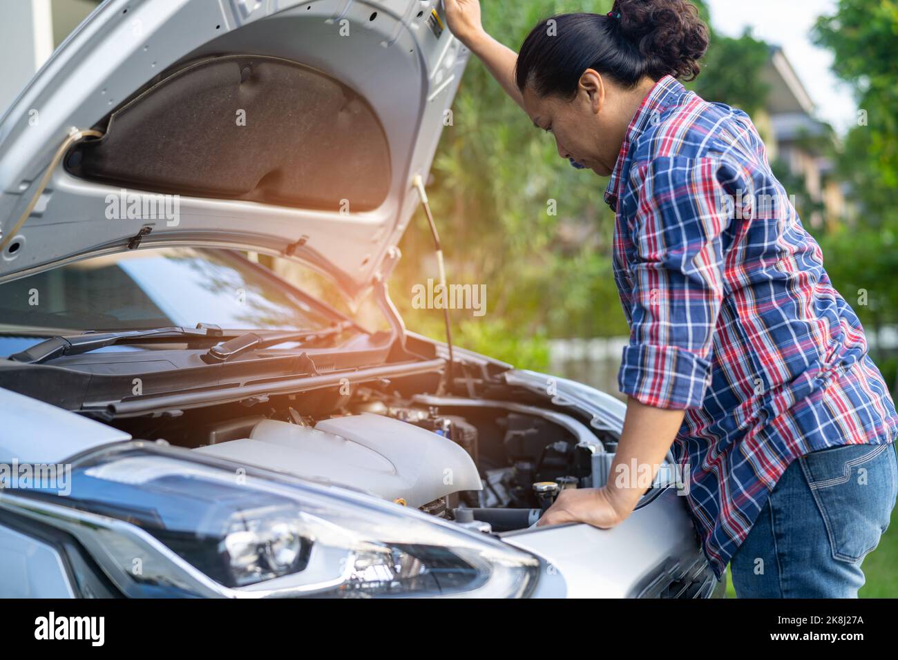 Open hood mechanic engine system to check and repair damage car crash ...