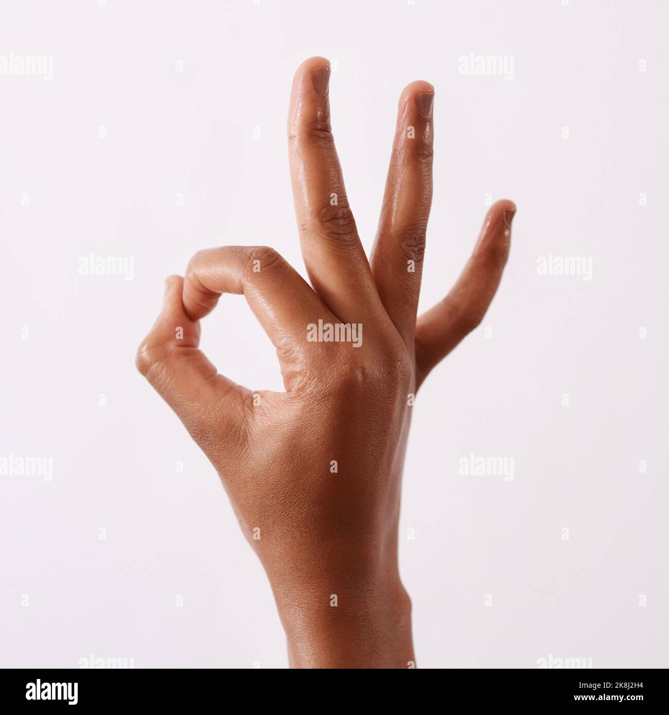 Youre doing just fine. Studio shot of an unrecognizable woman making an ...