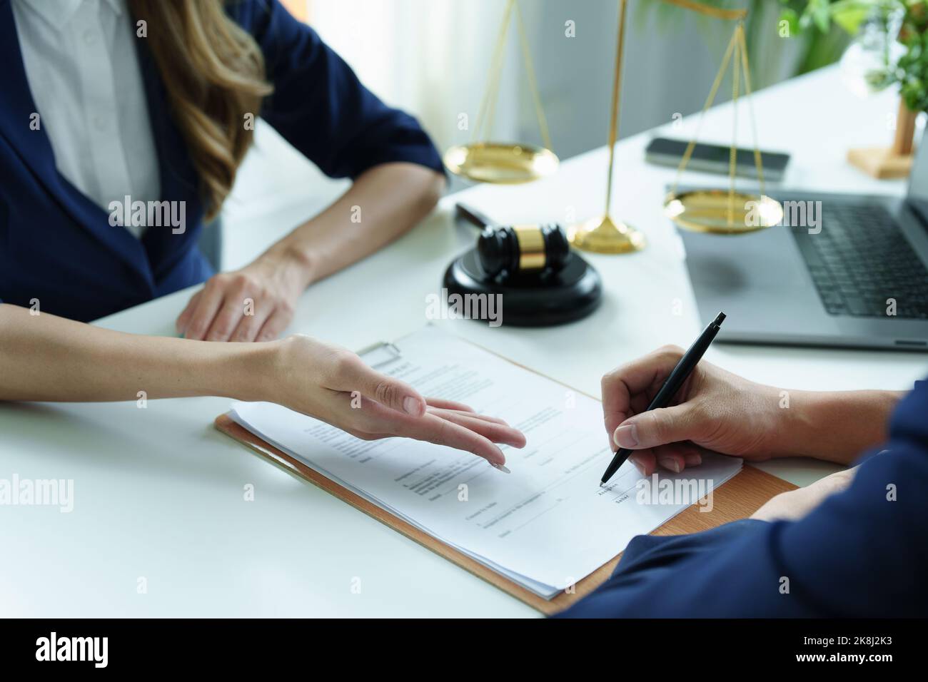 Signing of important documents in conducting business according to ...