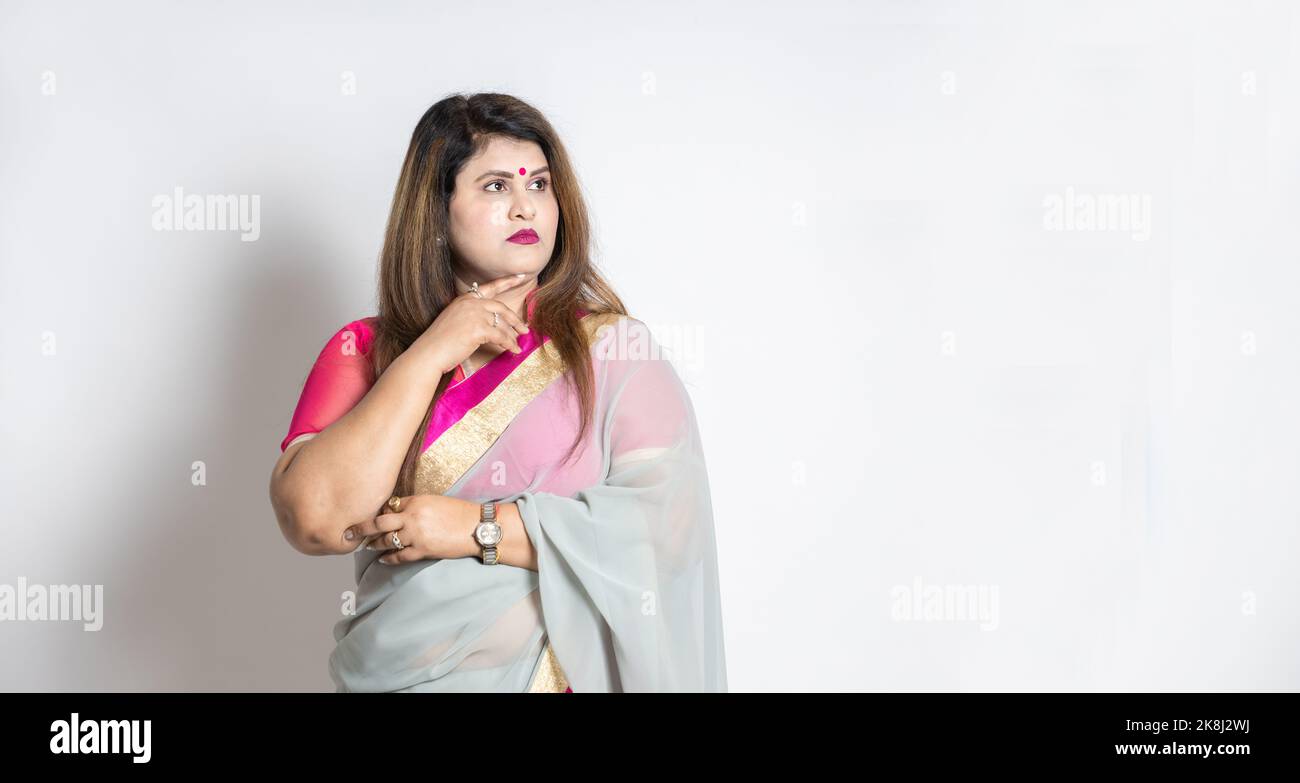 Portrait of overweight mature beautiful indian woman wearing saree ...