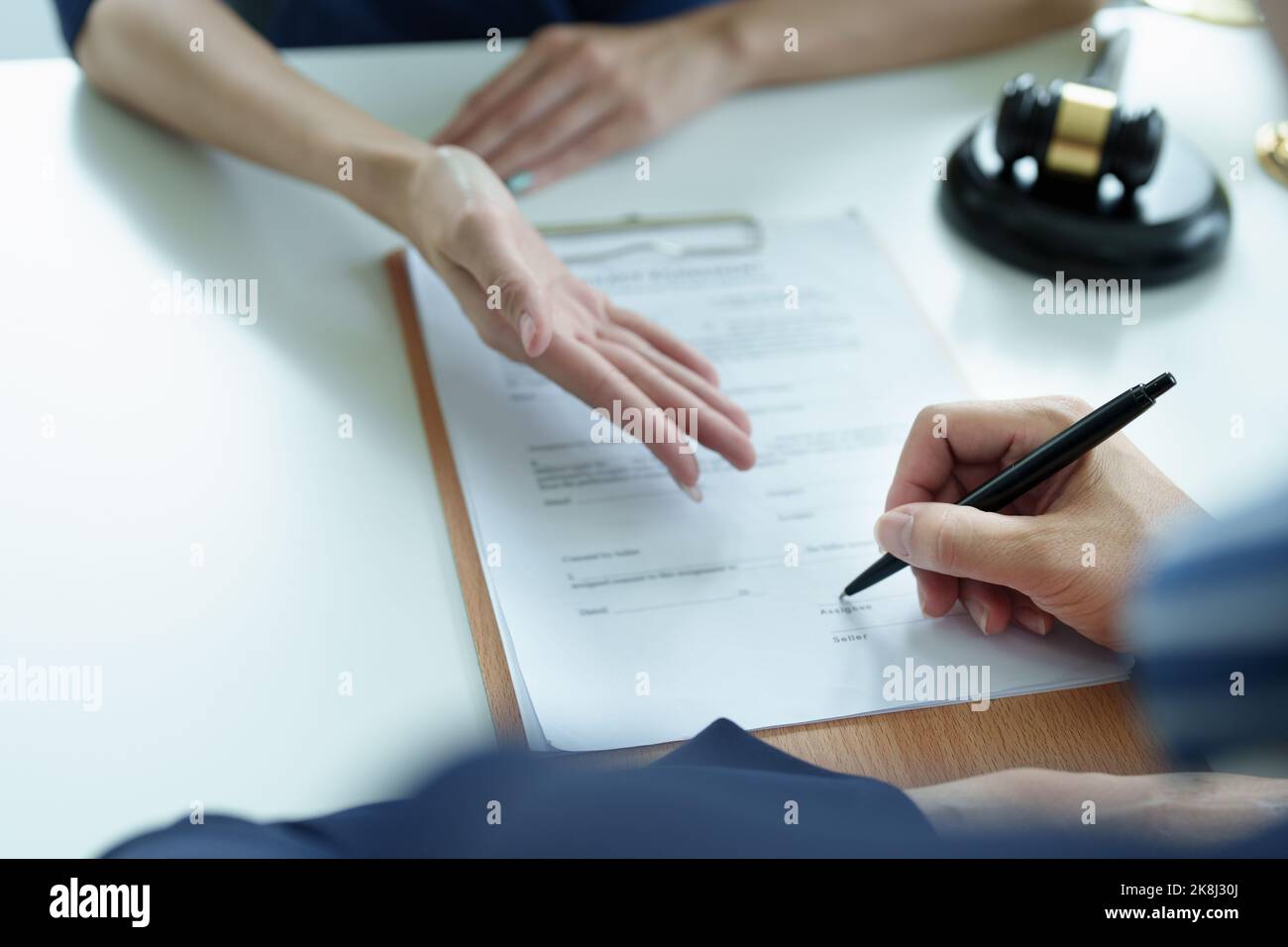 Signing of important documents in conducting business according to ...