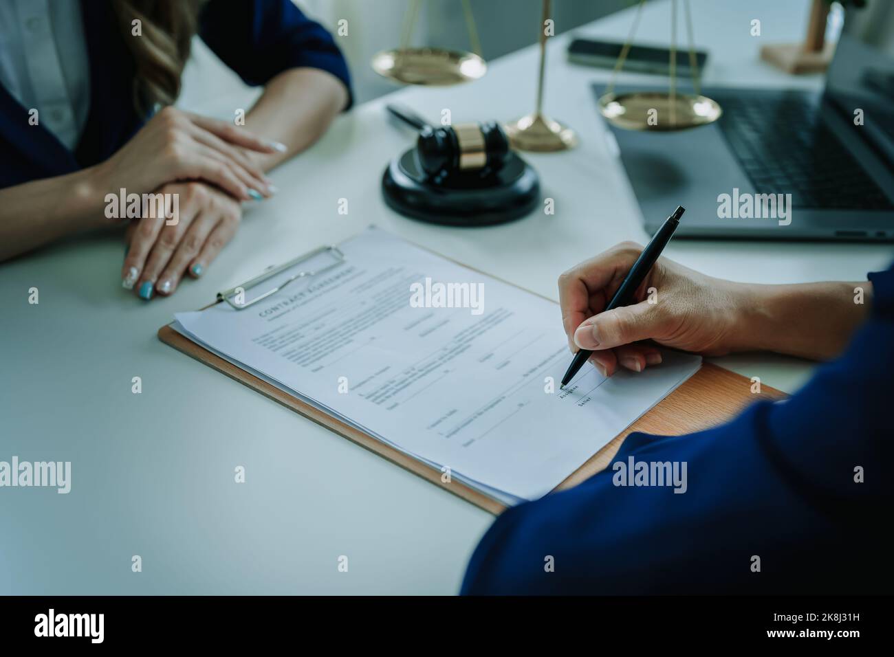 Signing of important documents in conducting business according to ...