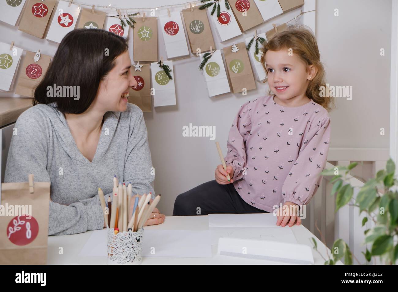 Child write list parent hi-res stock photography and images - Alamy