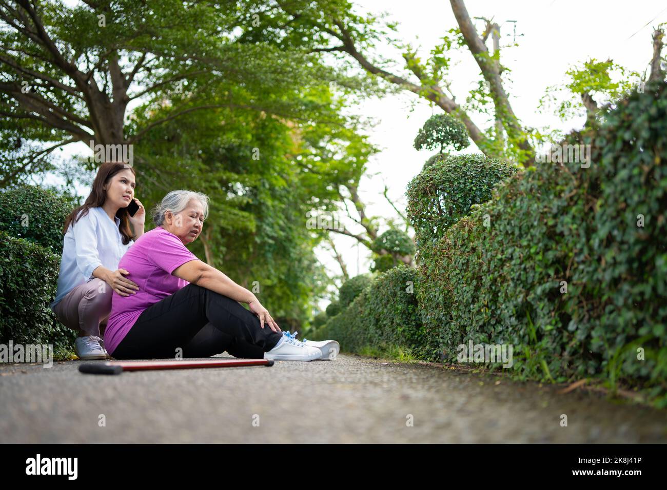 Asian senior woman fell down on lying floor because faint and limb ...