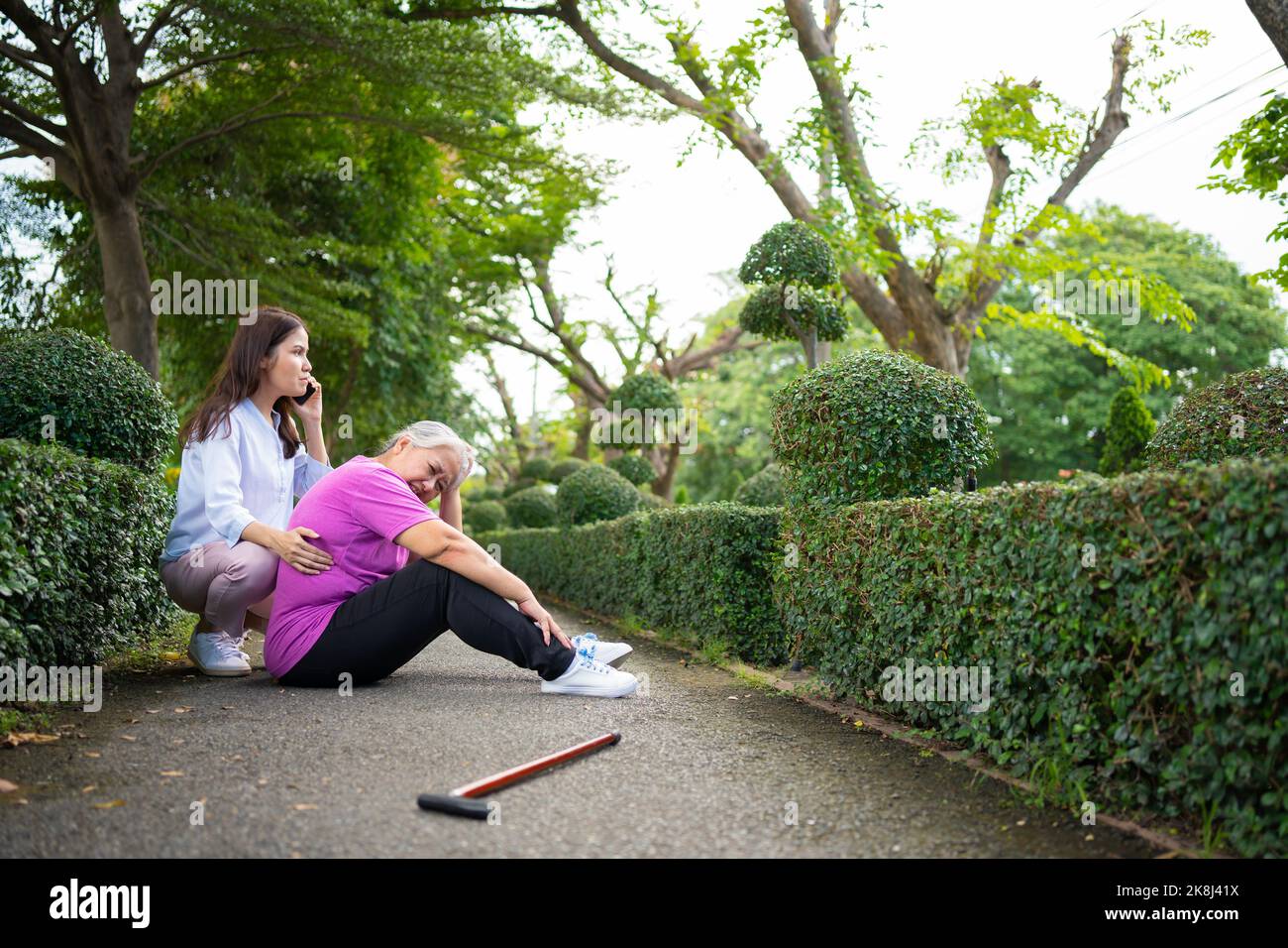 Asian senior woman fell down on lying floor because faint and limb ...