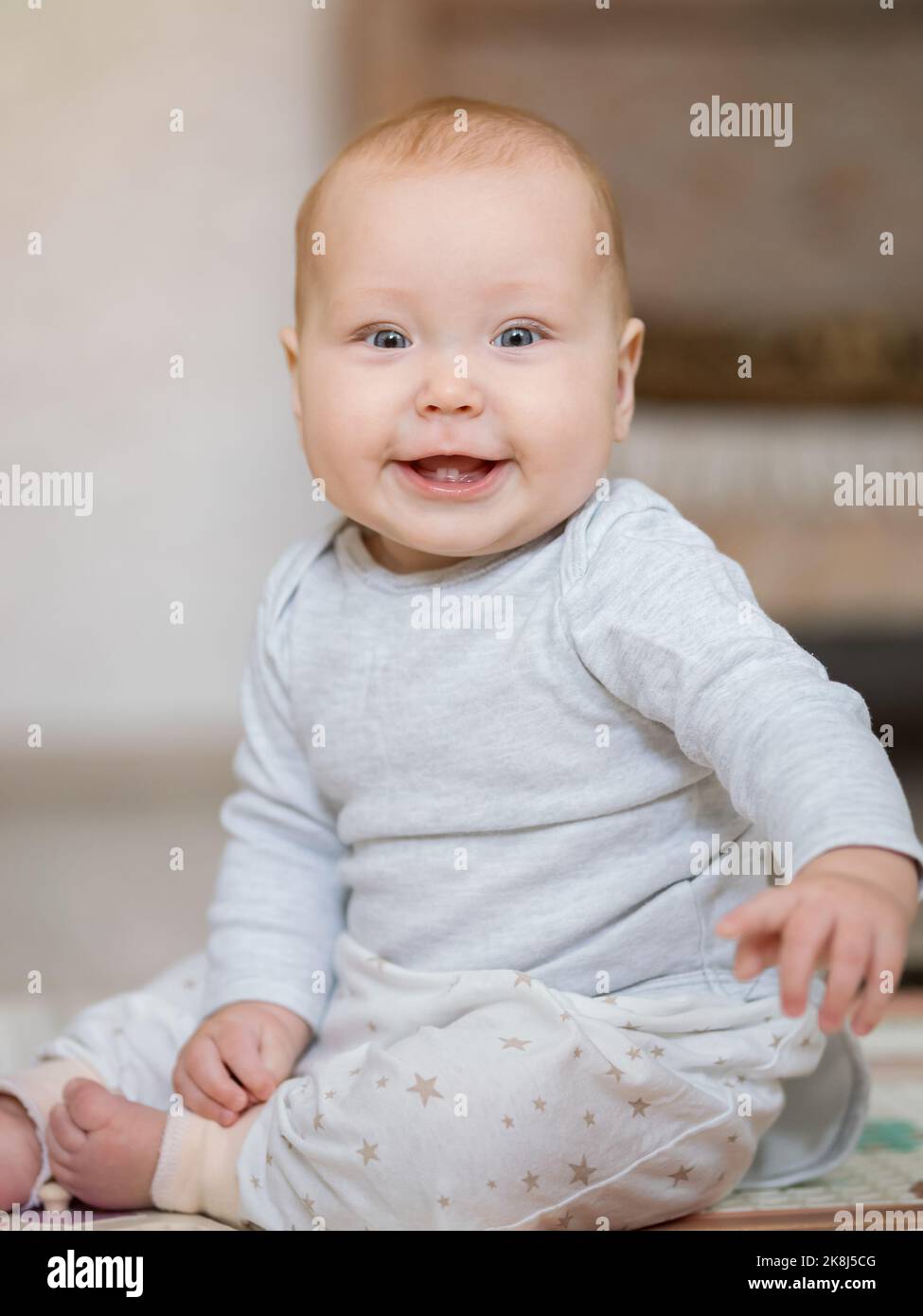 Baby girl excited expression enjoys hi-res stock photography and images ...