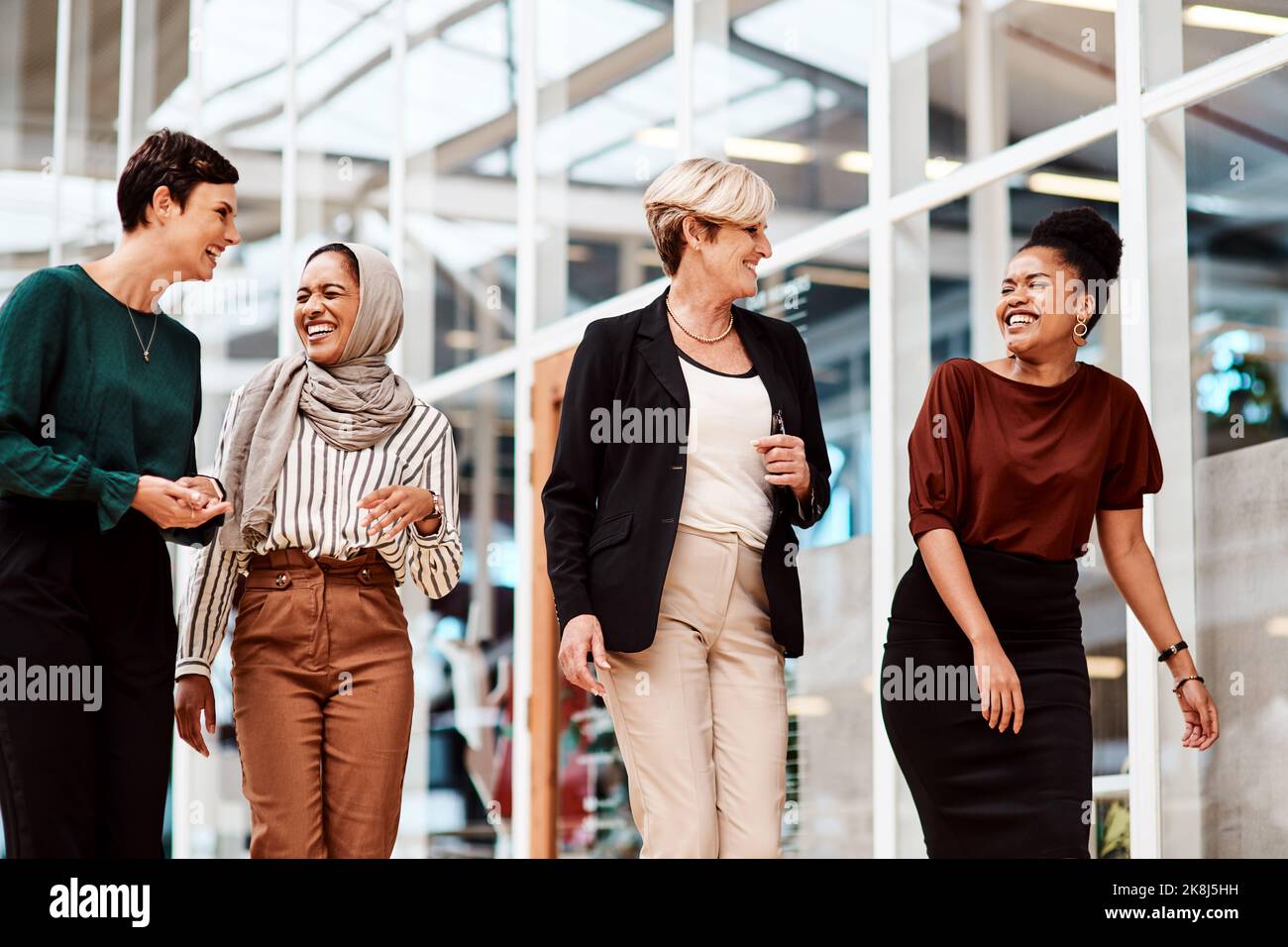 Walking into the office as a group of go-getters. a group of ...