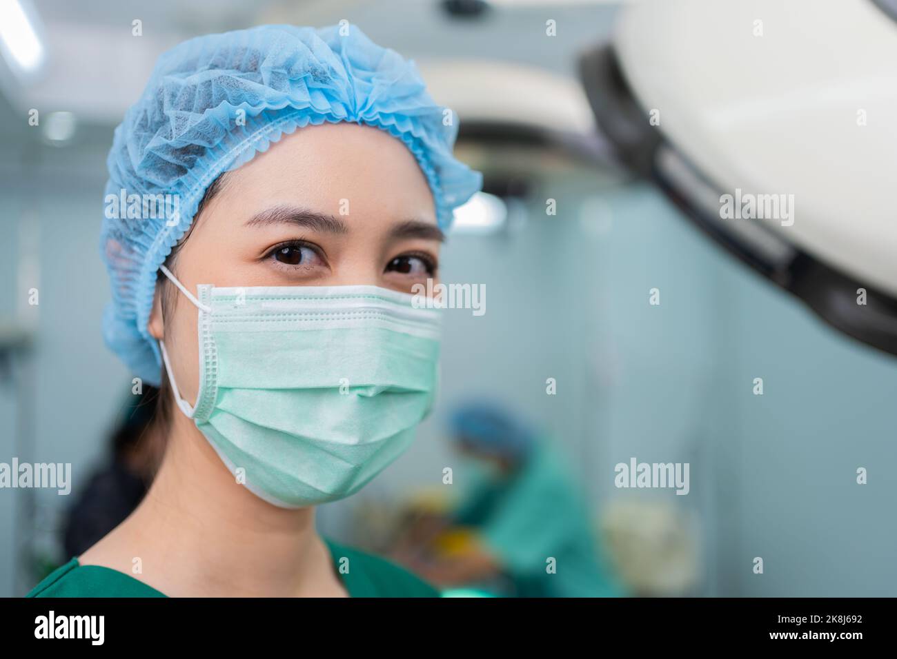Asian female surgeon in operating room hi-res stock photography and ...
