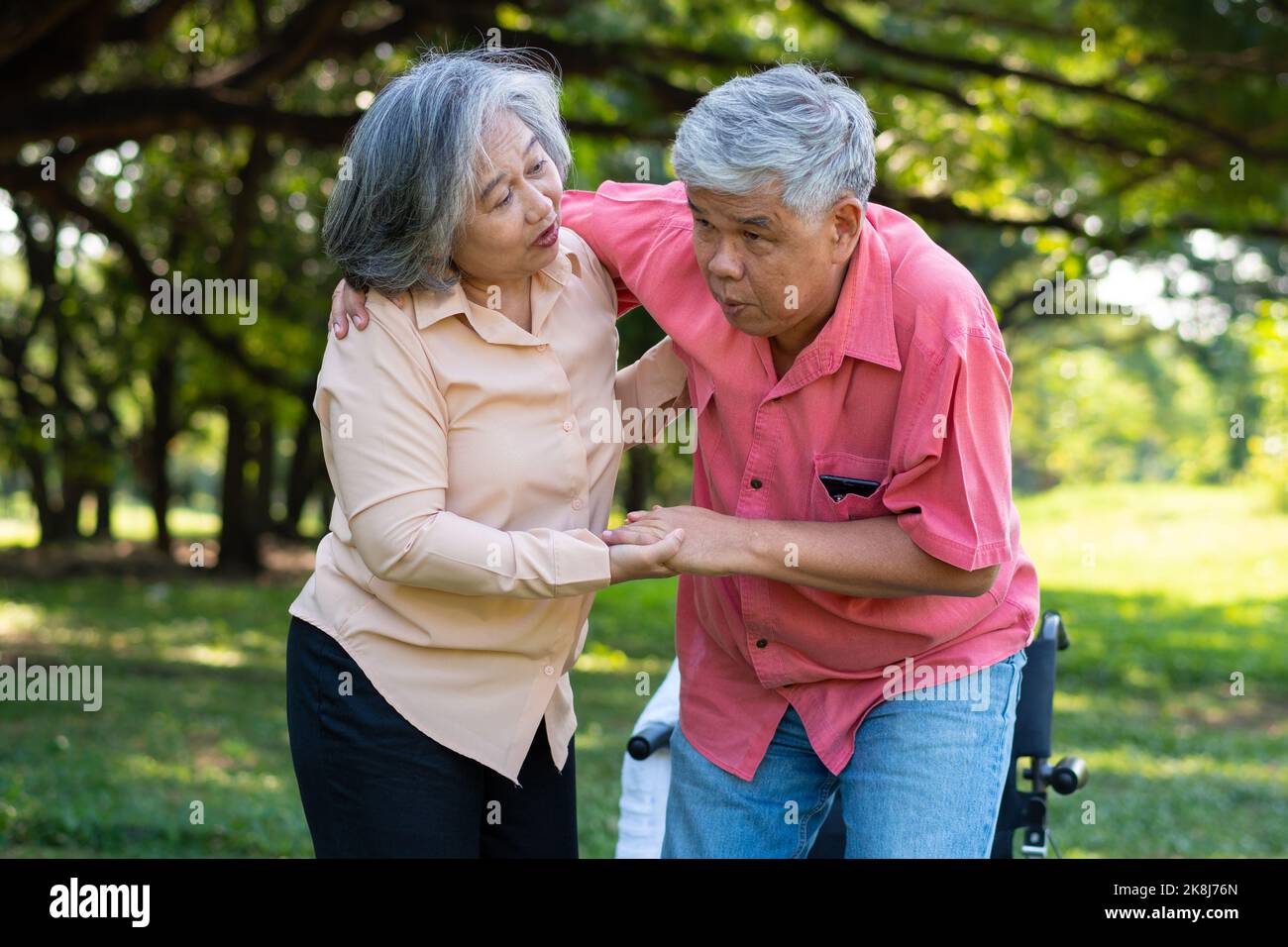 Asian senior man falling down on lying floor at park after Stumbled and ...