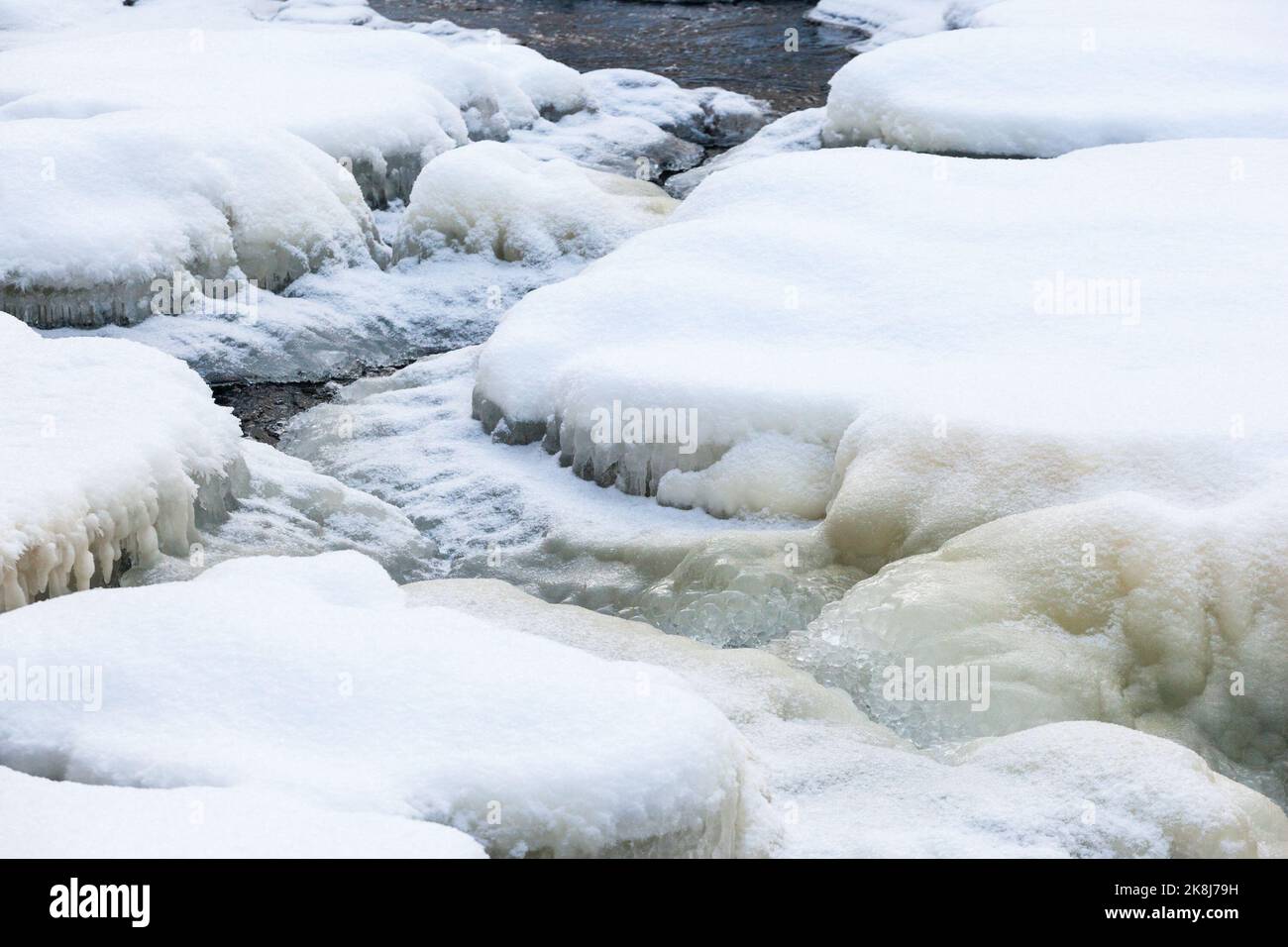Frozen river landscape during the winter Stock Photo - Alamy