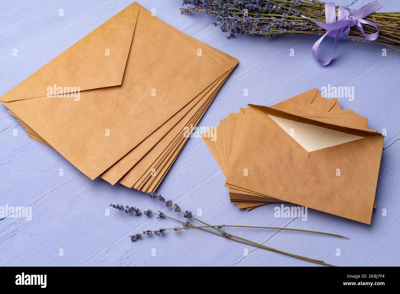 Letter envelope on lavender wooden background, copy space Stock Photo ...