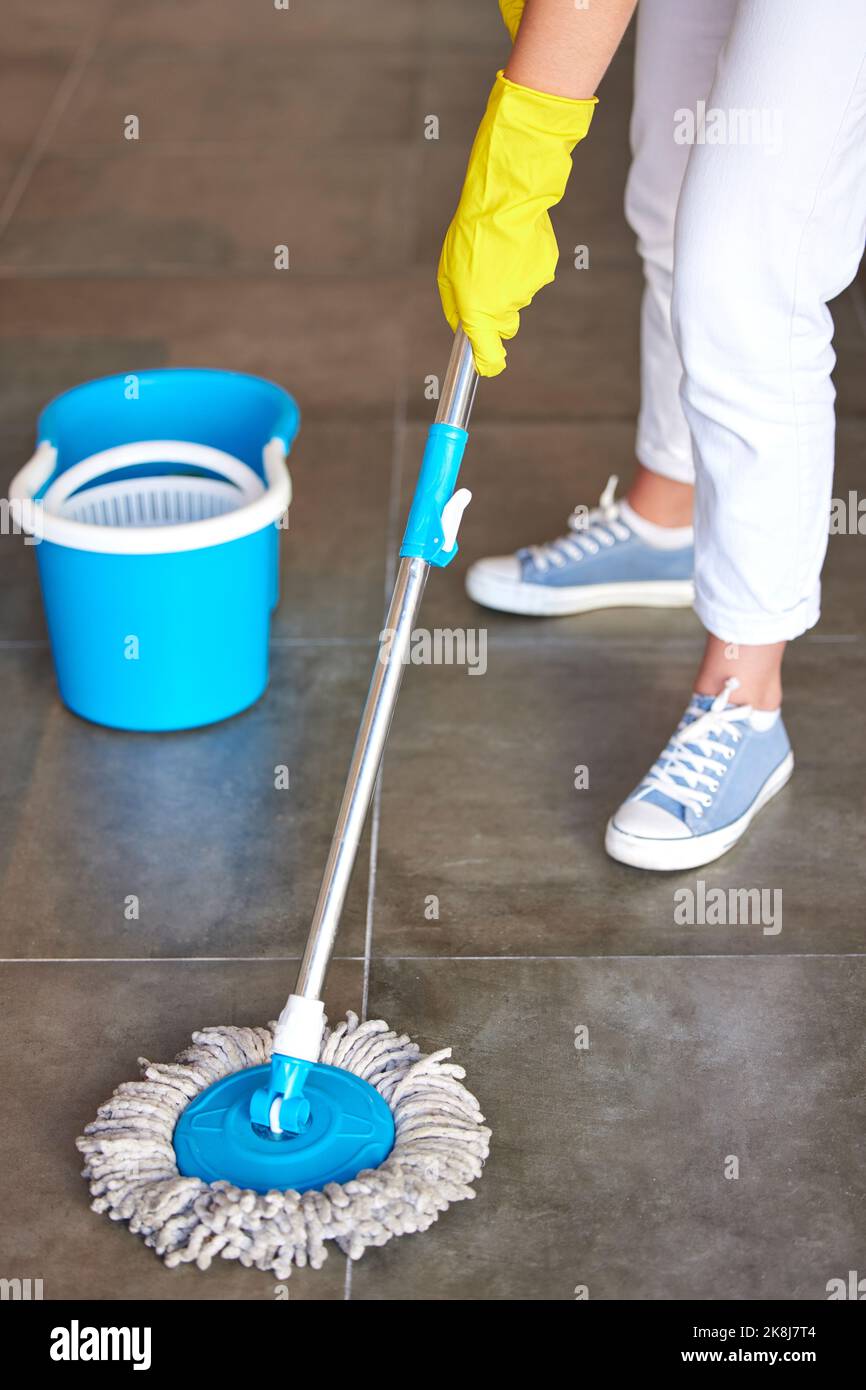 Woman, mop or bucket in floor cleaning at home or office building by ...