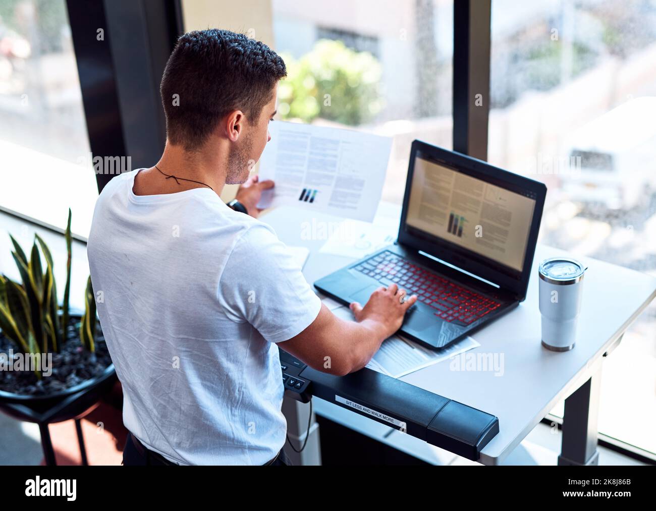 Professional man walking laptop computer hi-res stock photography and ...