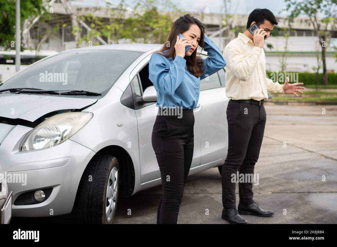 Two drivers call insurance after a car accident before taking pictures ...