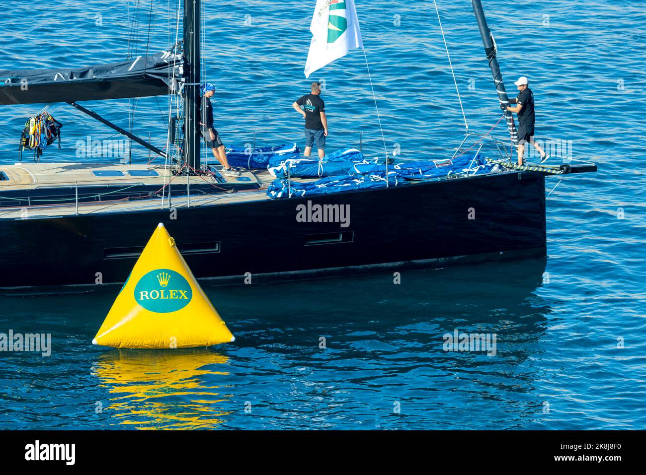 Crew on a competing yacht in the Middle Sea Race 2022 preparing their ...