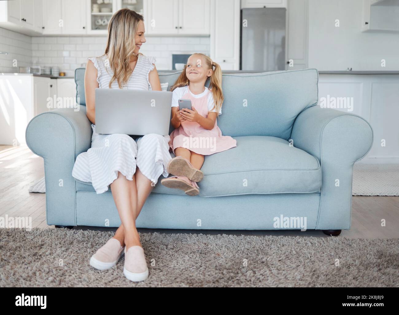 Mother, girl child and digital device happy, learn and smile for ...