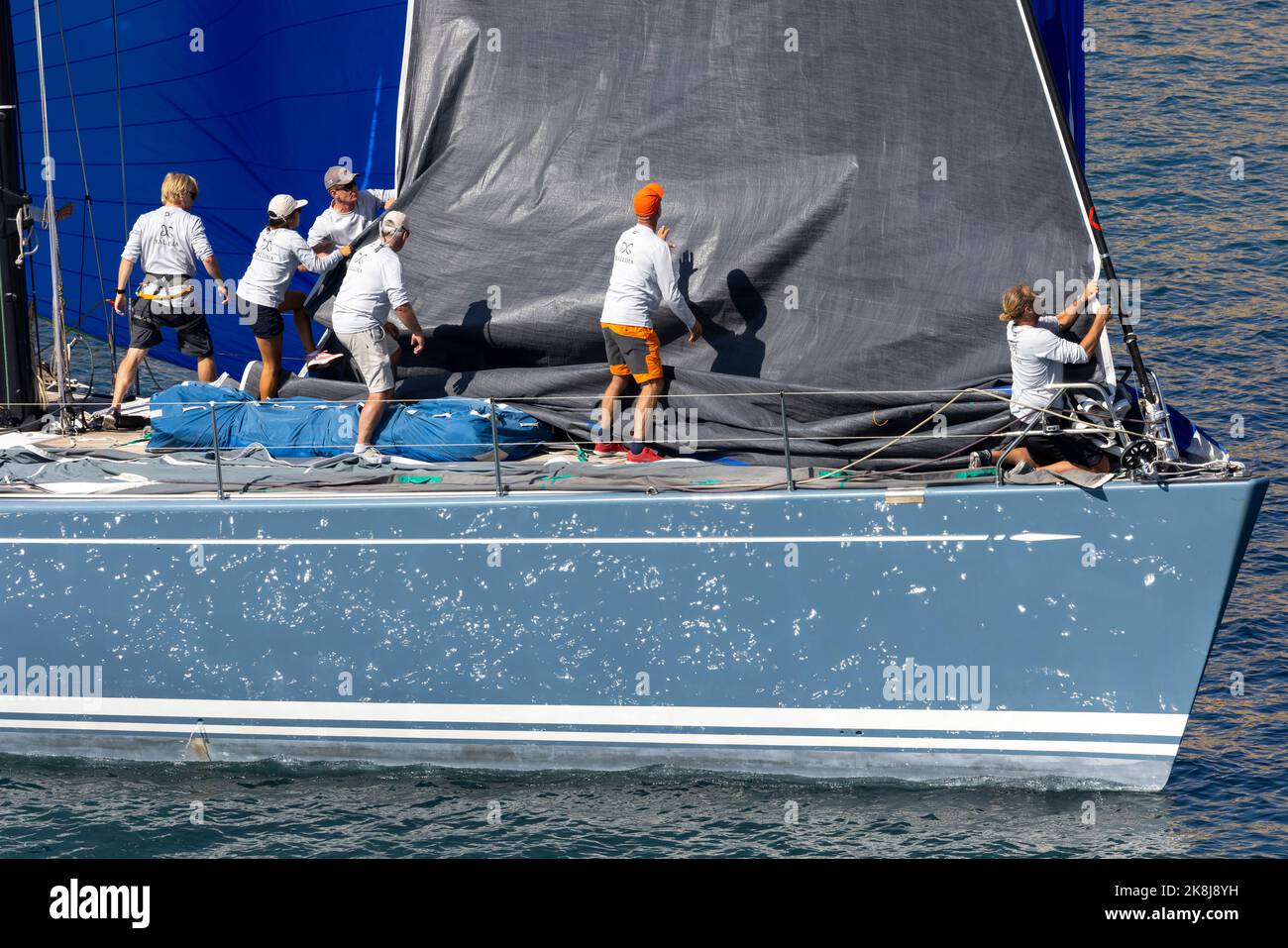 Crew on a competing yacht in the Middle Sea Race 2022 preparing their ...