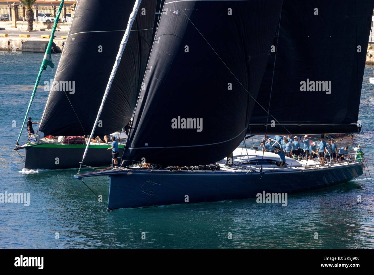 Crew on a competing yacht in the Middle Sea Race 2022 preparing their ...