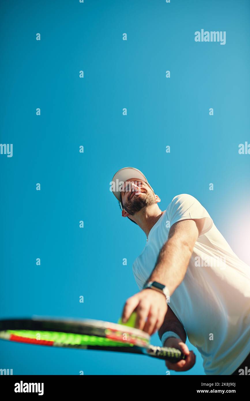 Champions keep playing until they get it right. Low angle shot of a ...
