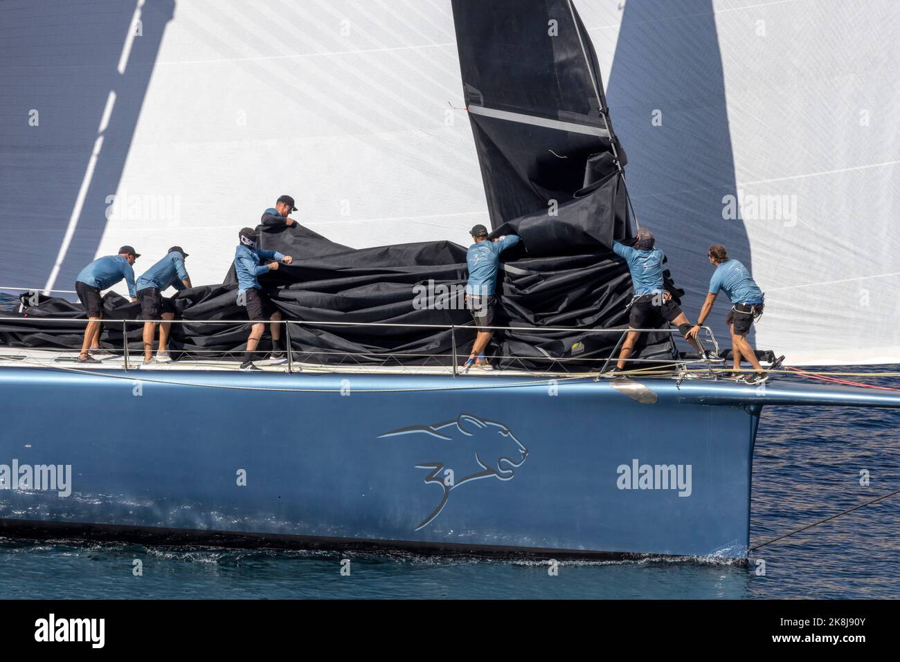 Crew on a competing yacht in the Middle Sea Race 2022 preparing their ...