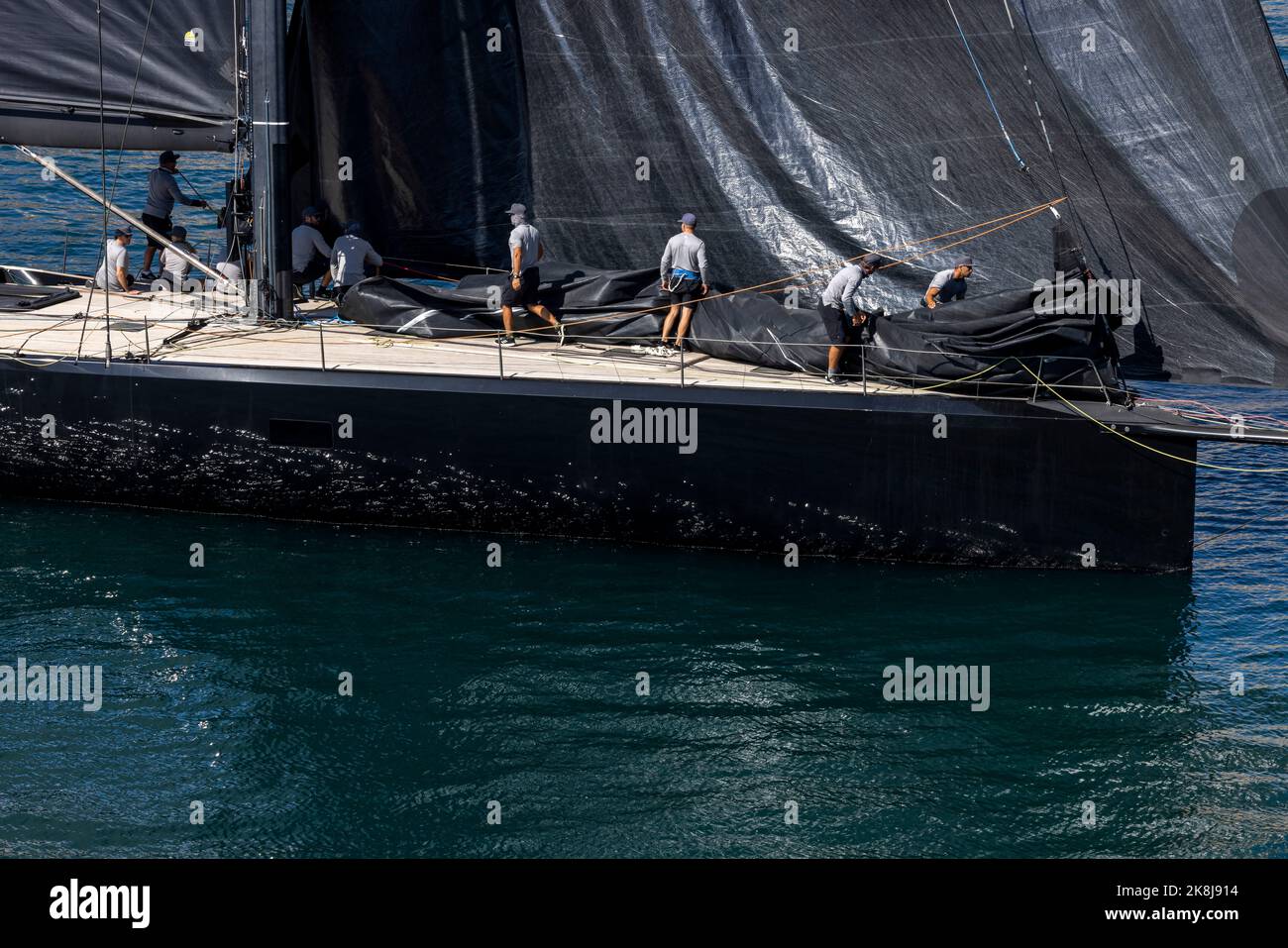 Crew on a competing yacht in the Middle Sea Race 2022 preparing their ...