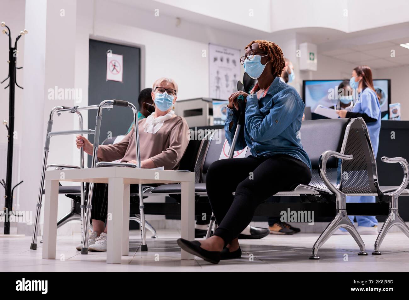 Physical rehabilitation office vestibule with multiple patients of different nationalities ...