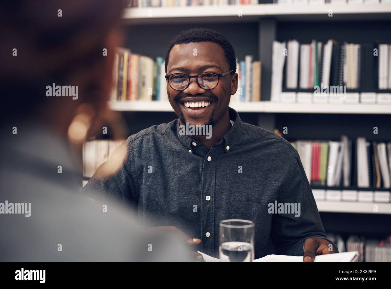 Working with positive people is the best. a handsome young male ...