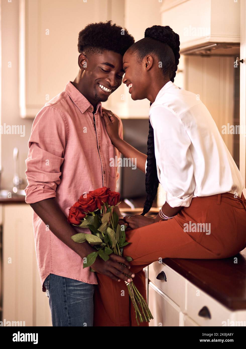 Isnt a romantic man just attractive. an affectionate young man giving ...