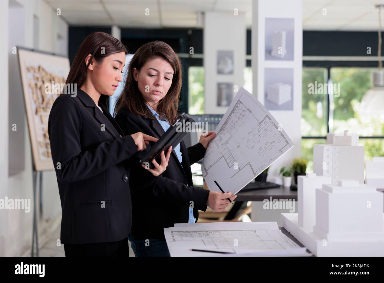 Engineers Holding Draft Discussing Construction Project Sketch Architects Working With