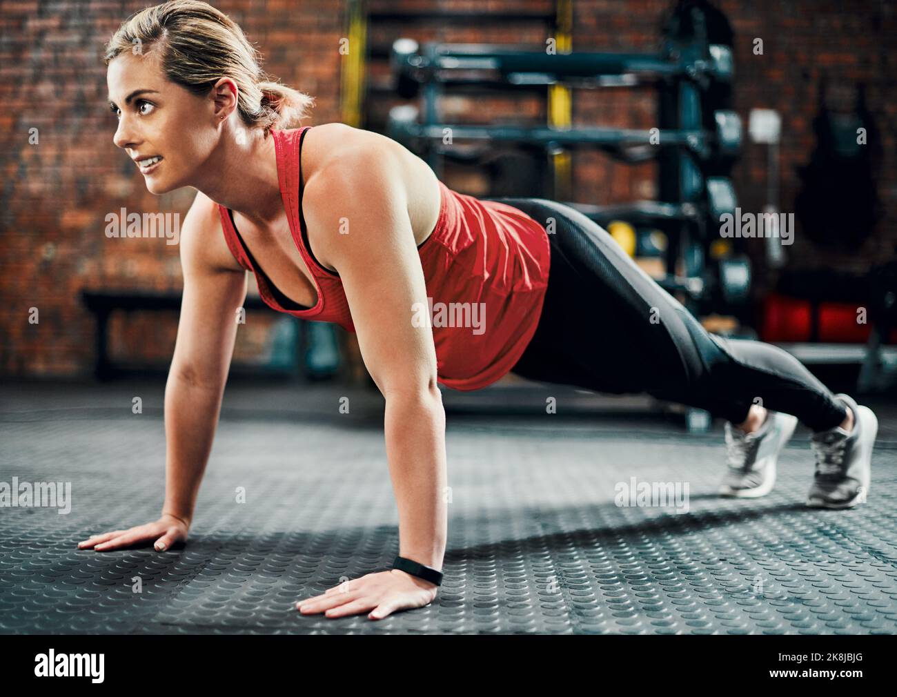 Getting stronger with every second. Full length shot of an attractive young female athlete ...