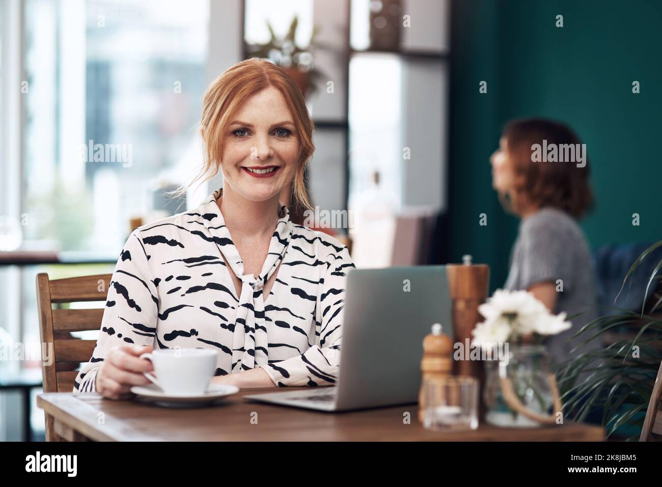 Now for another coffee. Portrait of an attractive middle aged woman ...