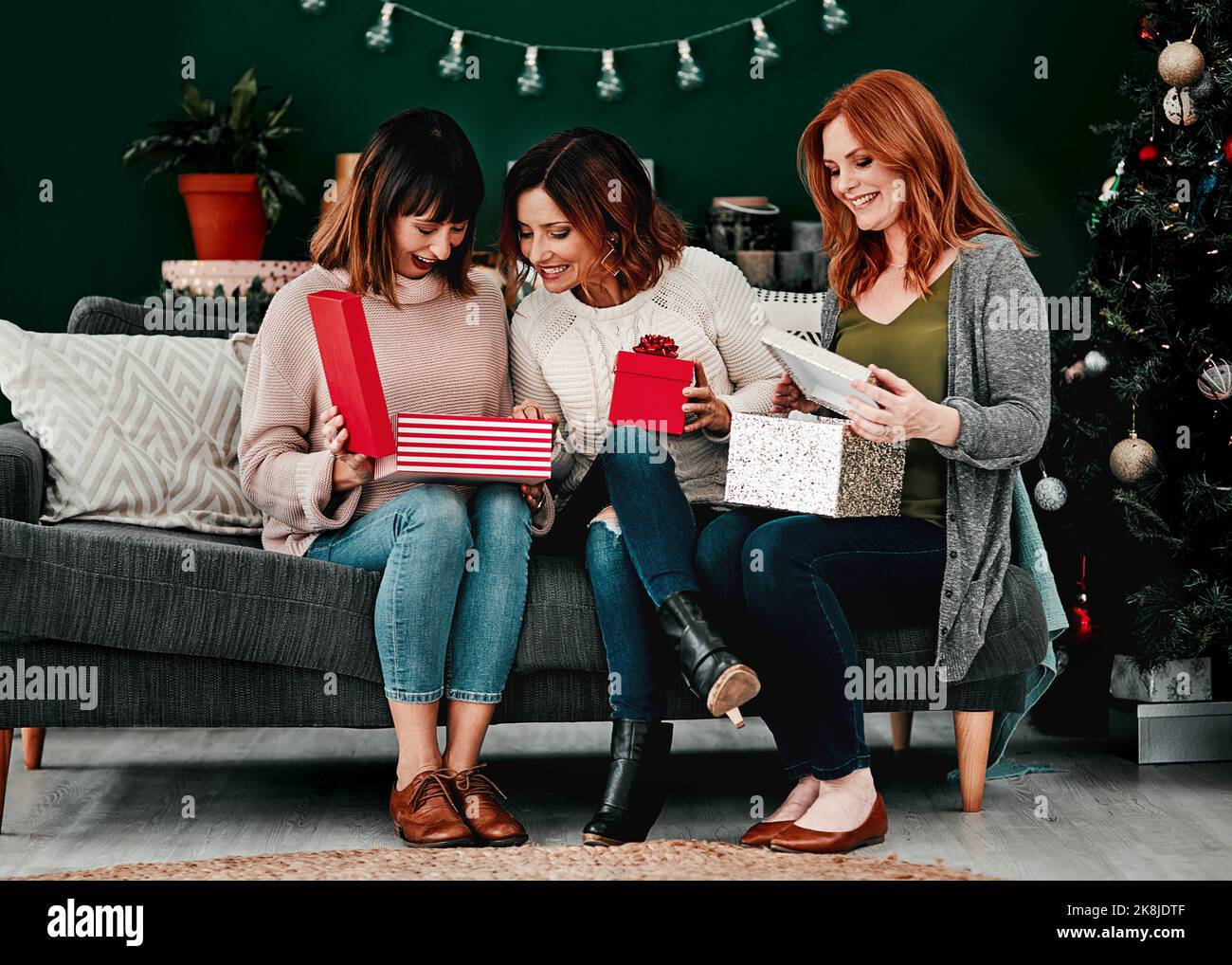 That looks stunning. three attractive middle aged women opening ...